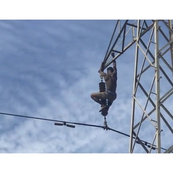 Man Climbs High Tension Pole (Pylon), Gets Electrocuted Due to ...